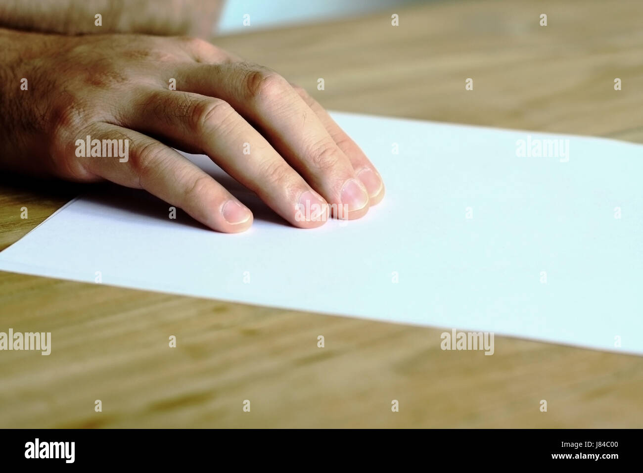 desk business man businessman back of the hand sheet of paper paper man ...