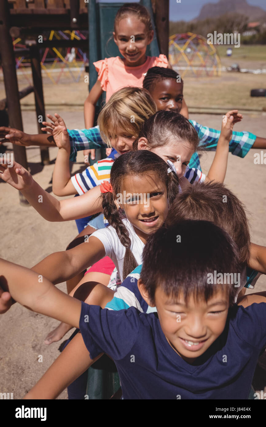 Schoolkids playing in playground hi-res stock photography and images ...