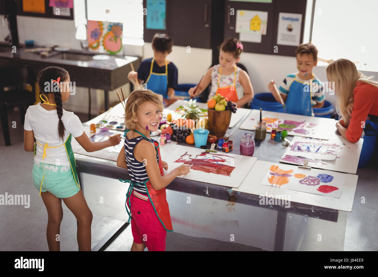 Schoolkids practicing drawing in school Stock Photo - Alamy