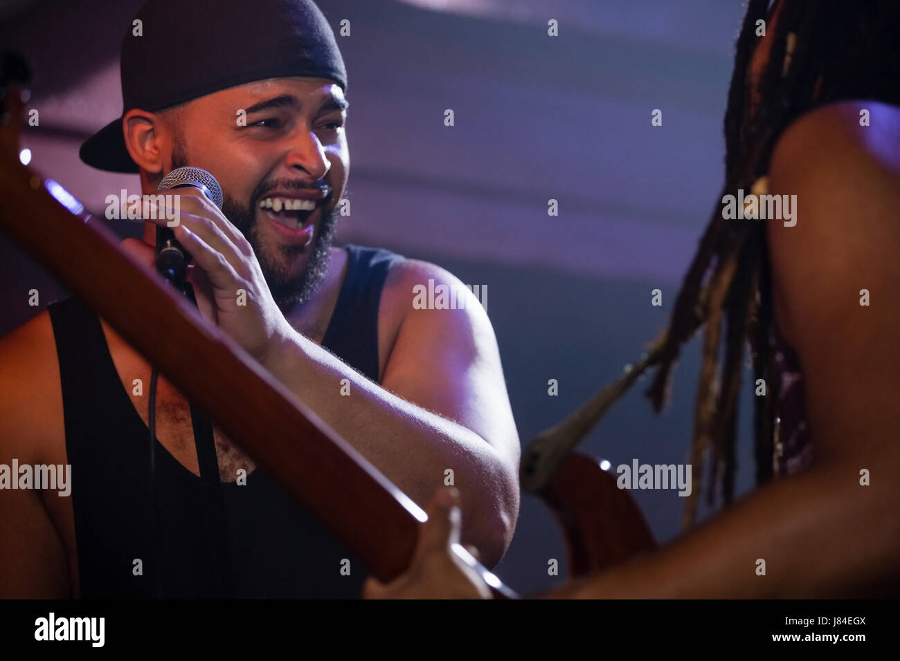 Band performing on stage in nightclub Stock Photo - Alamy