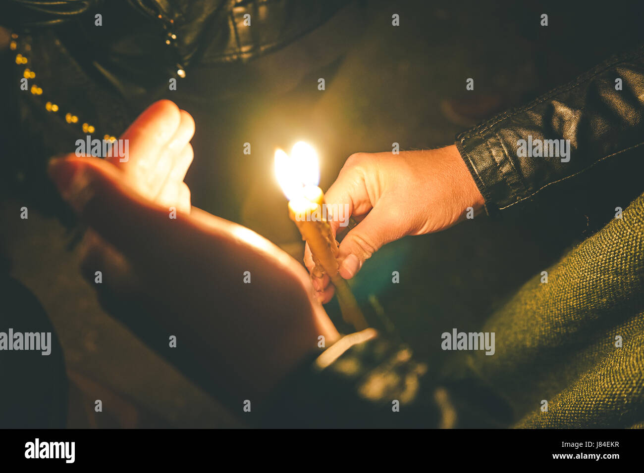 Woman holding a candle at night, during the Easter celebrations Stock ...