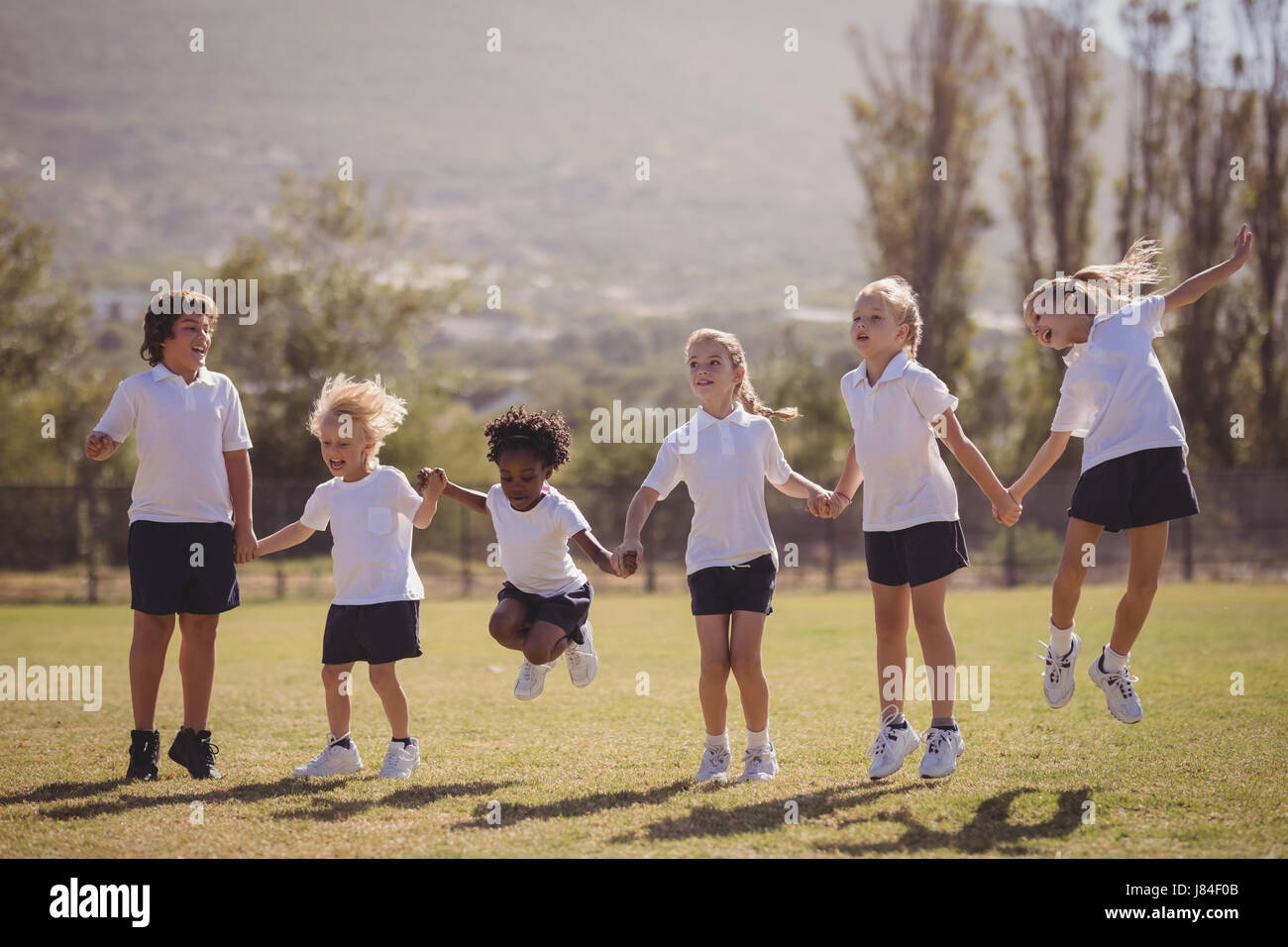 Schoolgirls in the park hi-res stock photography and images - Alamy