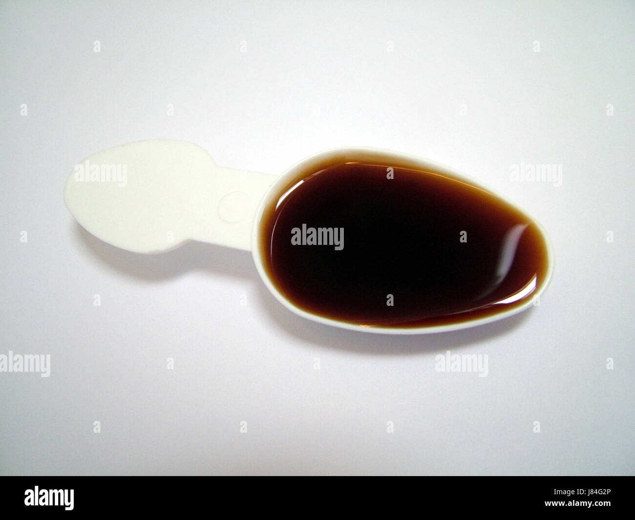 Drug syrup measurement hi-res stock photography and images - Alamy