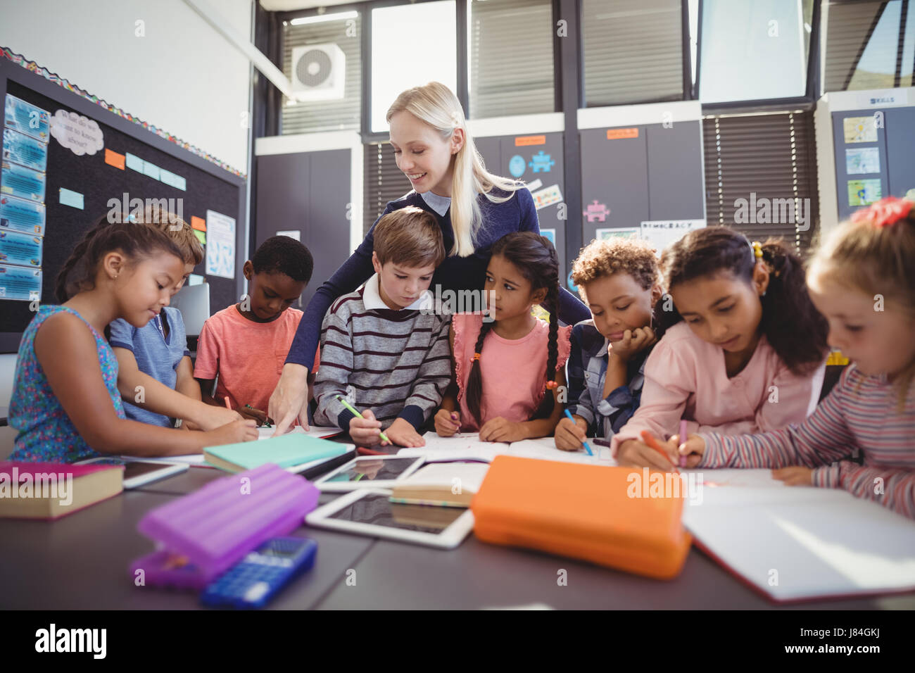 Boy girl class tablet pencil hi-res stock photography and images - Alamy