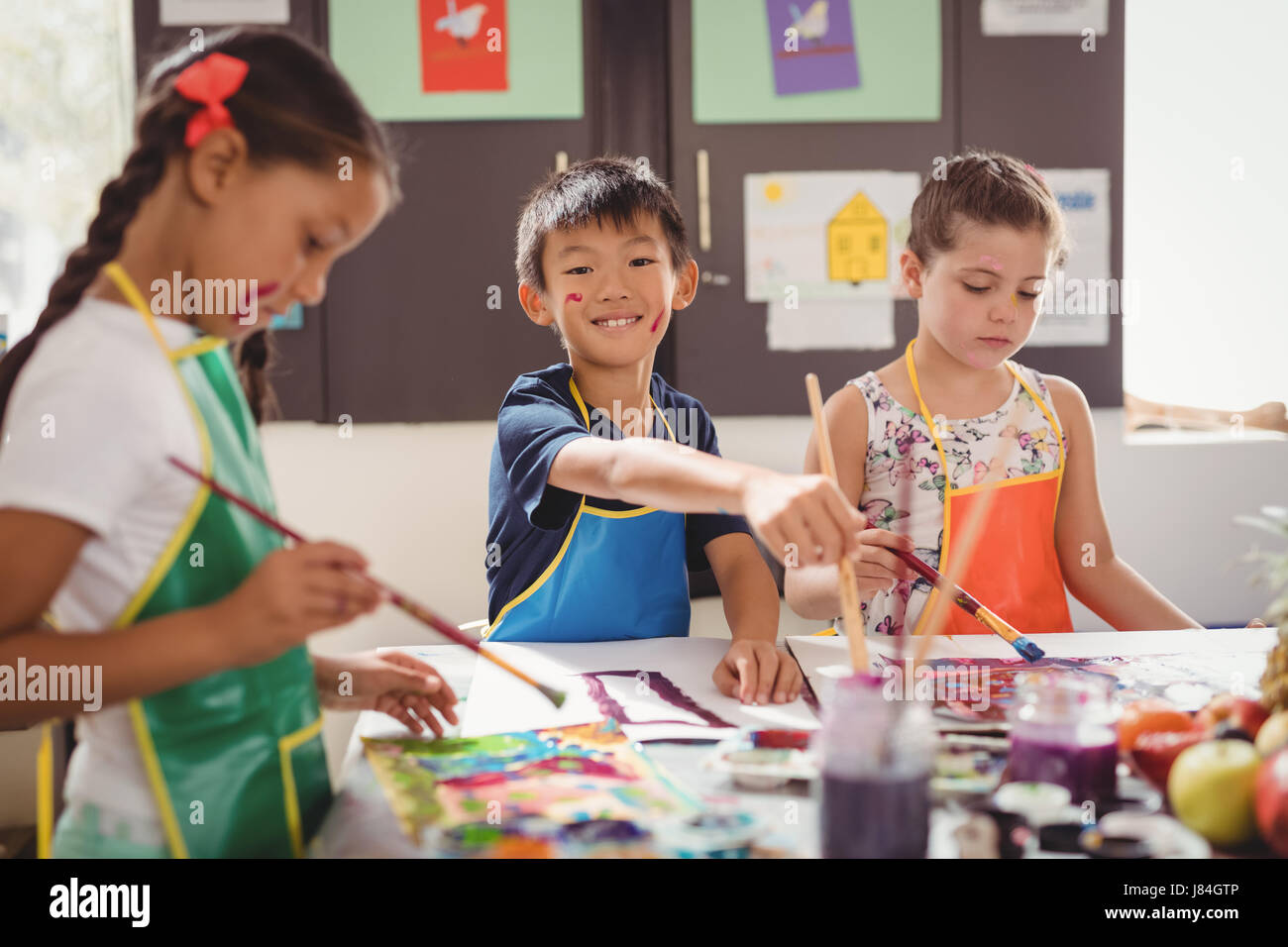 Schoolkids practicing drawing in school Stock Photo - Alamy