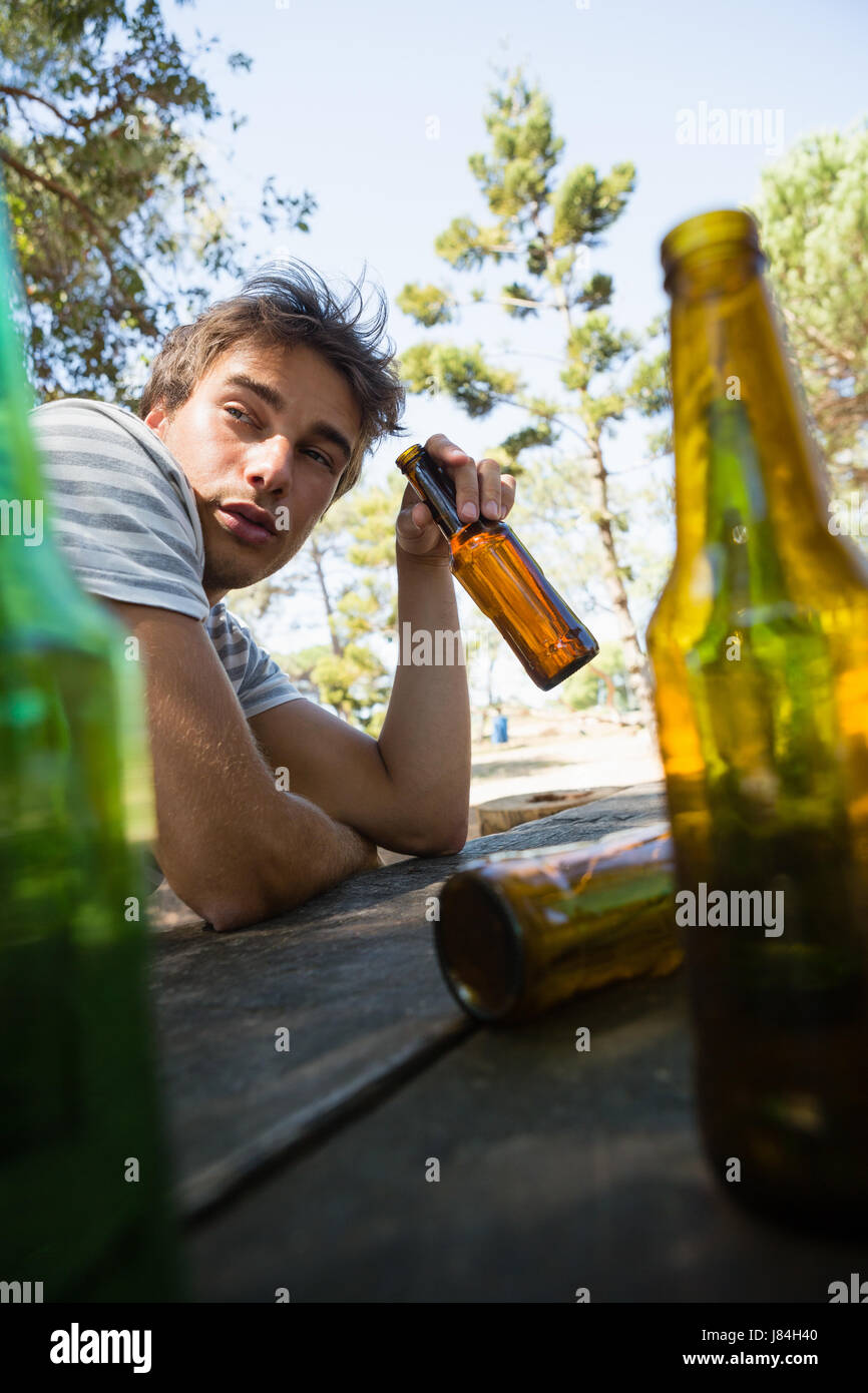 Man drinking beer from bottle hi-res stock photography and images - Alamy