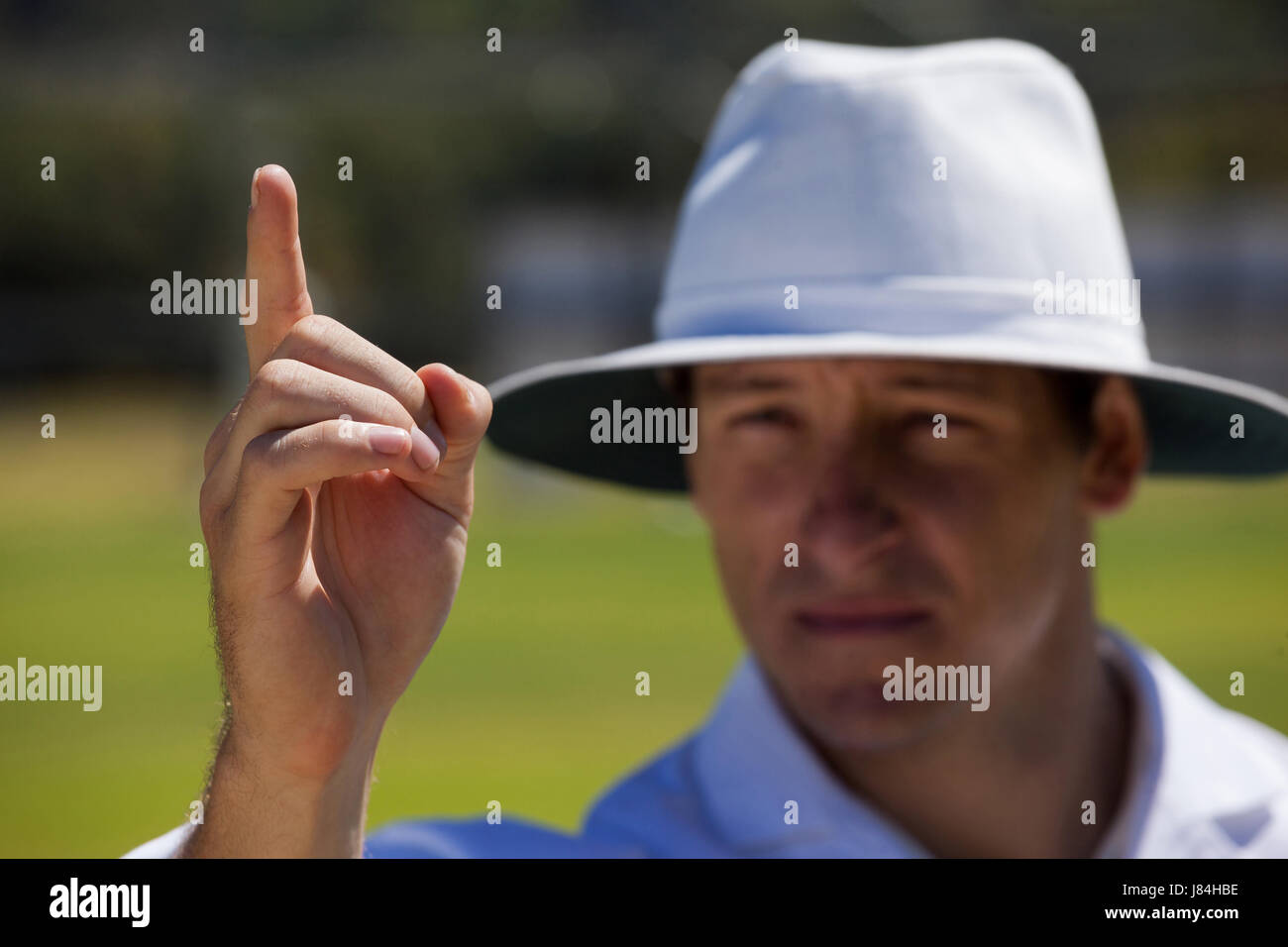Umpire pointing out hi-res stock photography and images - Alamy