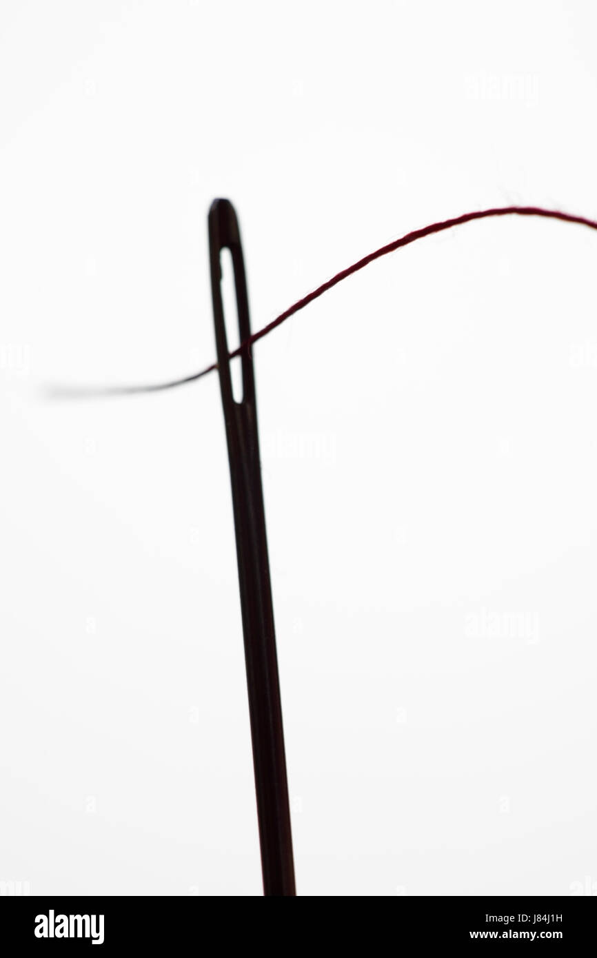 Through string hole hi-res stock photography and images - Alamy