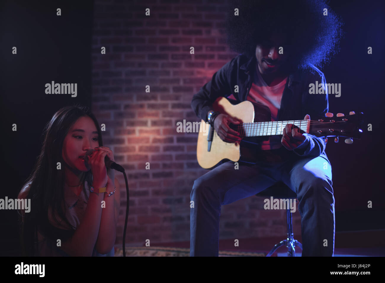 Female singer in festive hi-res stock photography and images - Alamy