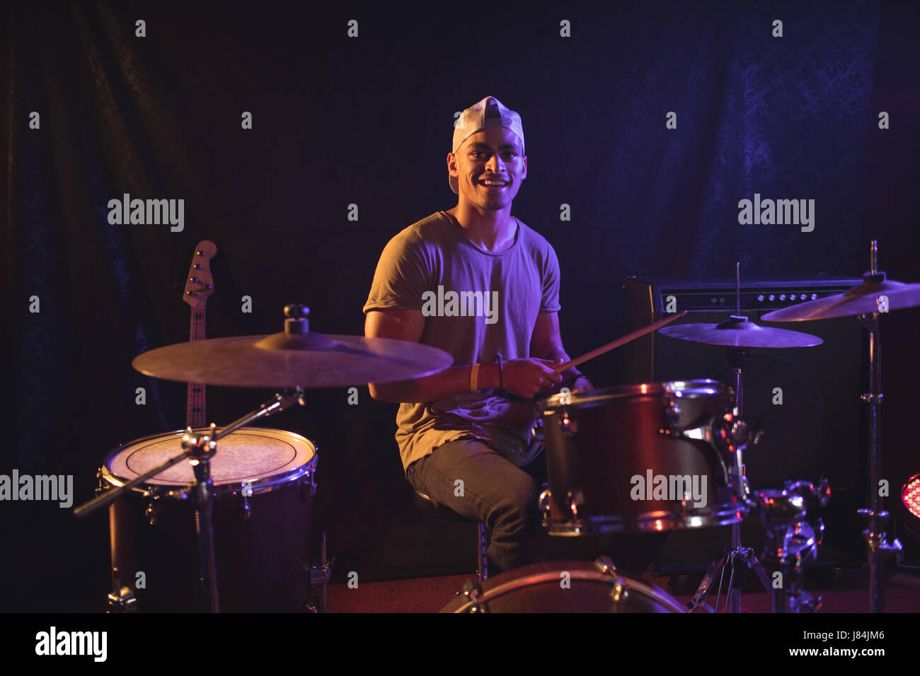 Portrait of male drummer performing in nightclub Stock Photo - Alamy