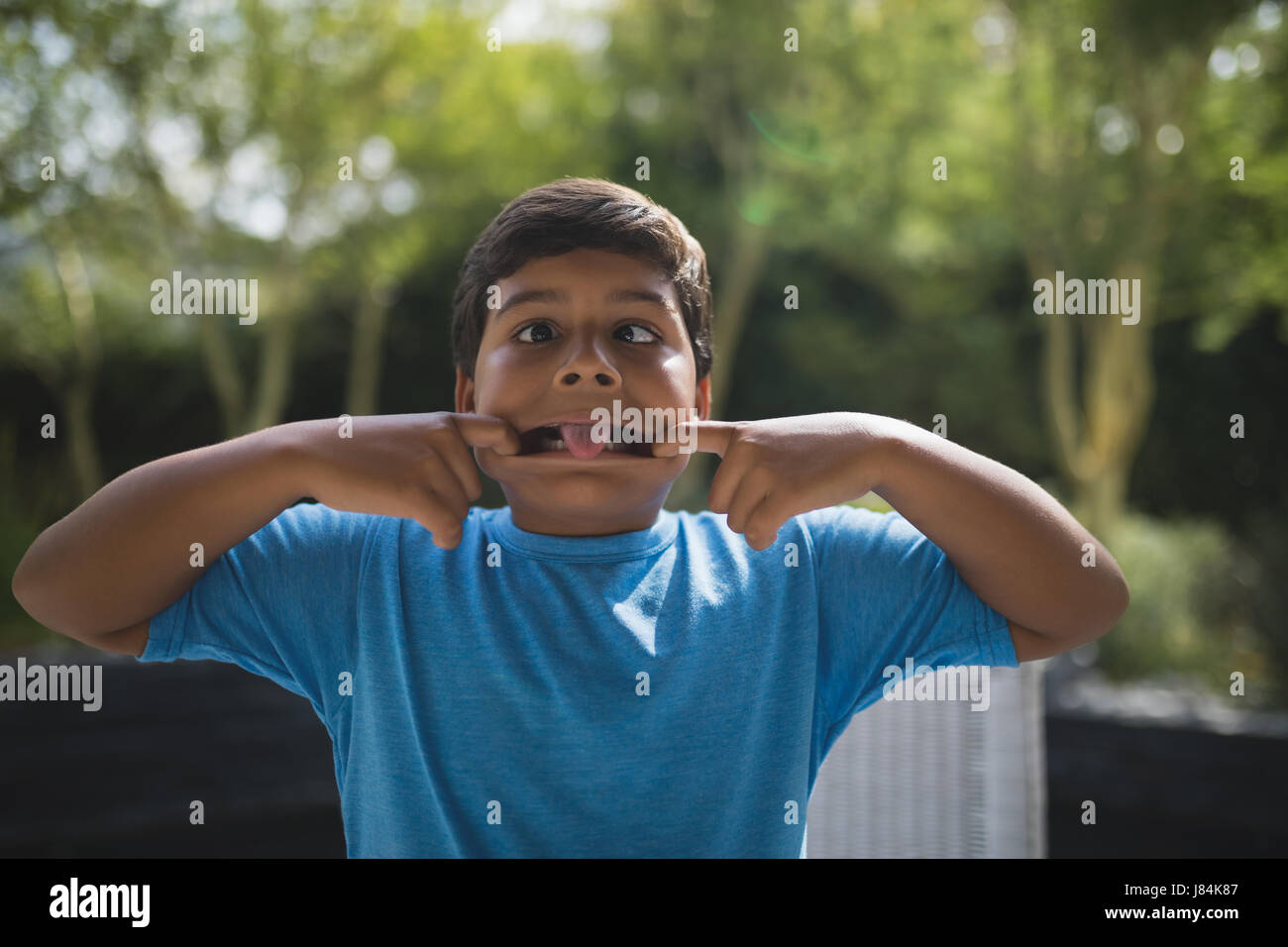 Naughty boy teasing hi-res stock photography and images - Alamy