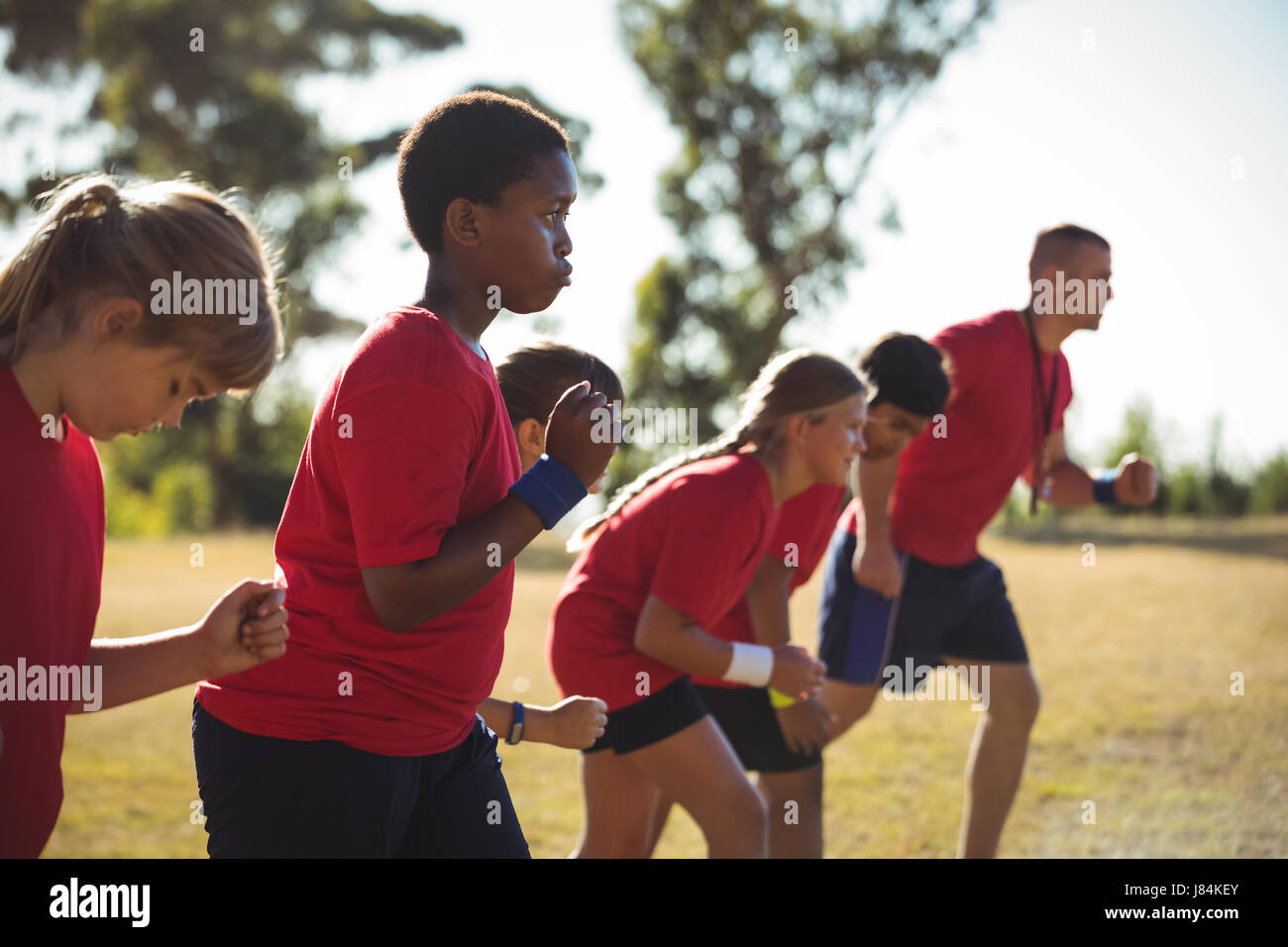 Trainer training kids in boot hi-res stock photography and images - Alamy