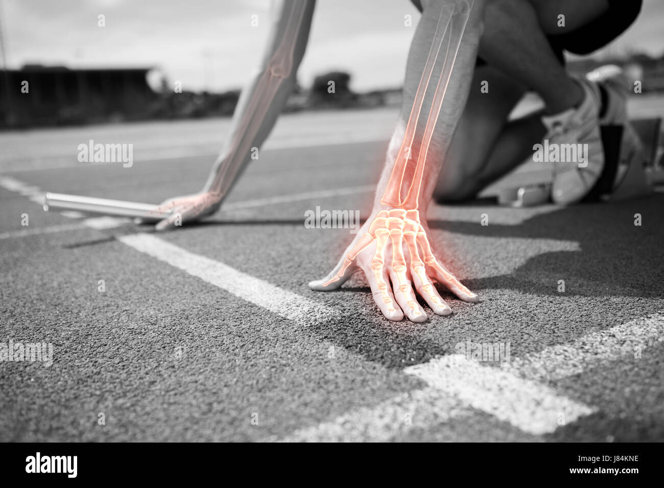 Digital composite of highlighted bones of man about to race Stock Photo ...