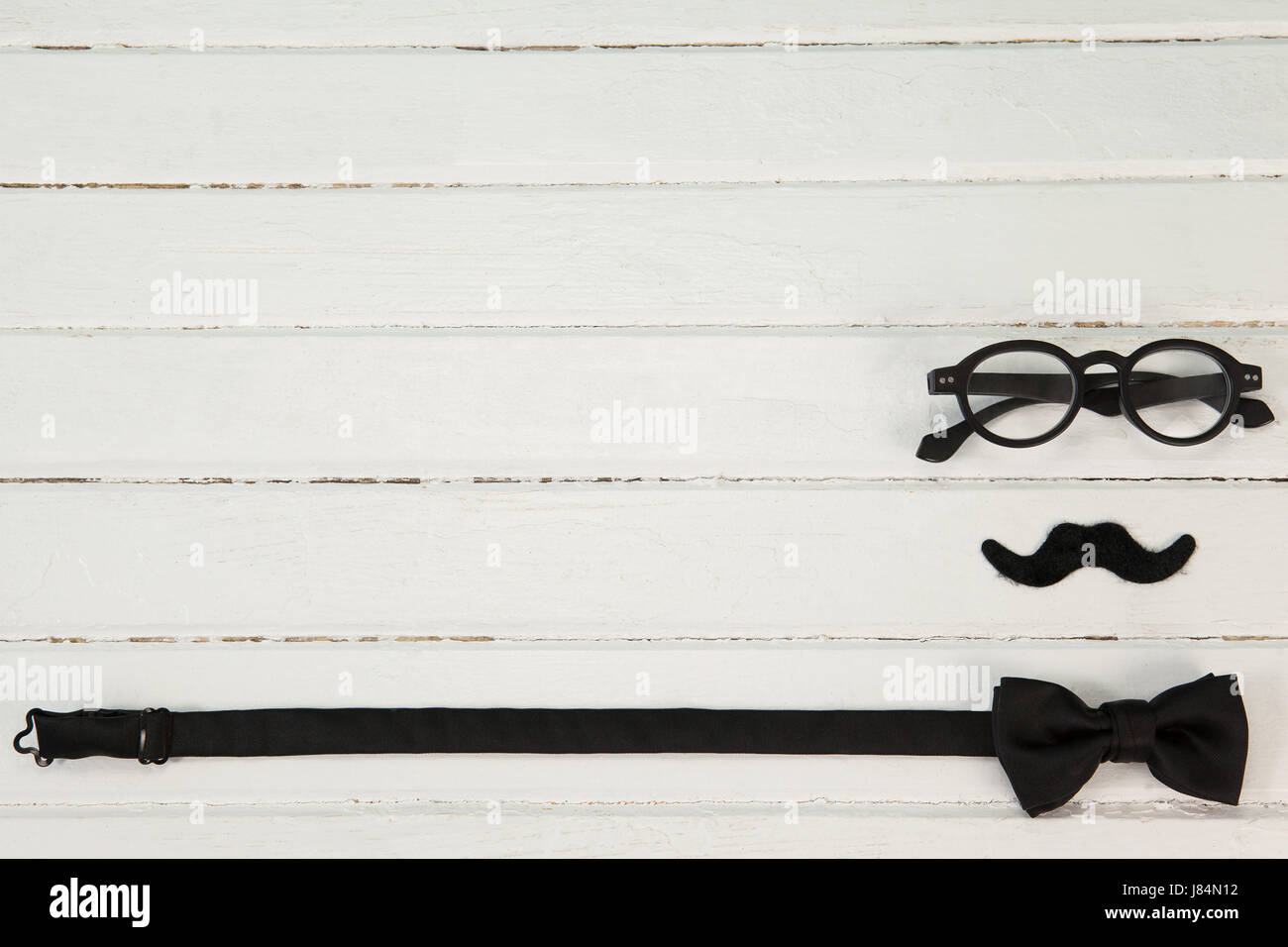 Overhead view of anthropomorphic face on wooden table Stock Photo - Alamy