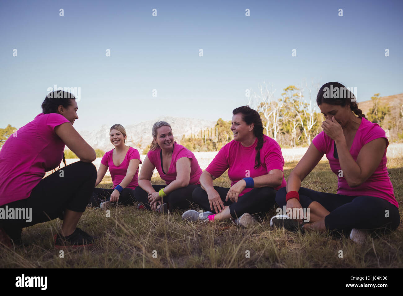 Female athletic coach instructing hi-res stock photography and images ...