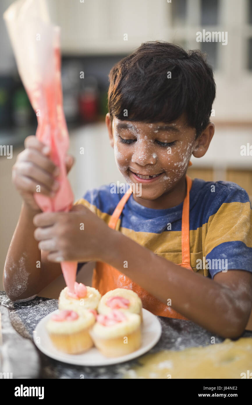 Boy making whipped cream hi-res stock photography and images - Alamy