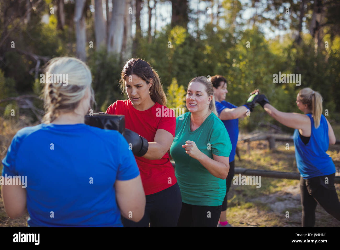 Mature woman with boxing glove hi-res stock photography and images - Alamy