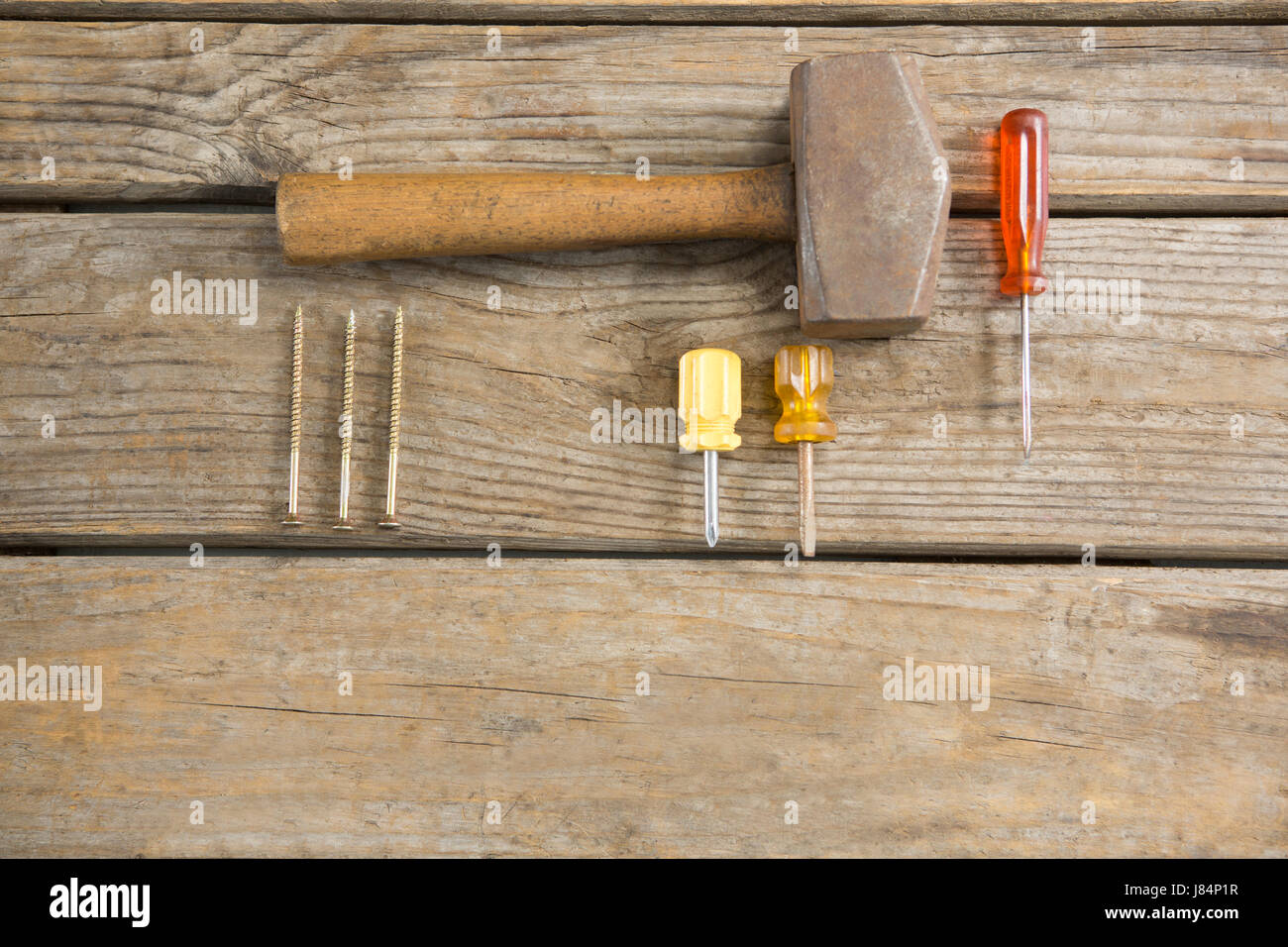 Overhead view of work tools on wooden table Stock Photo - Alamy