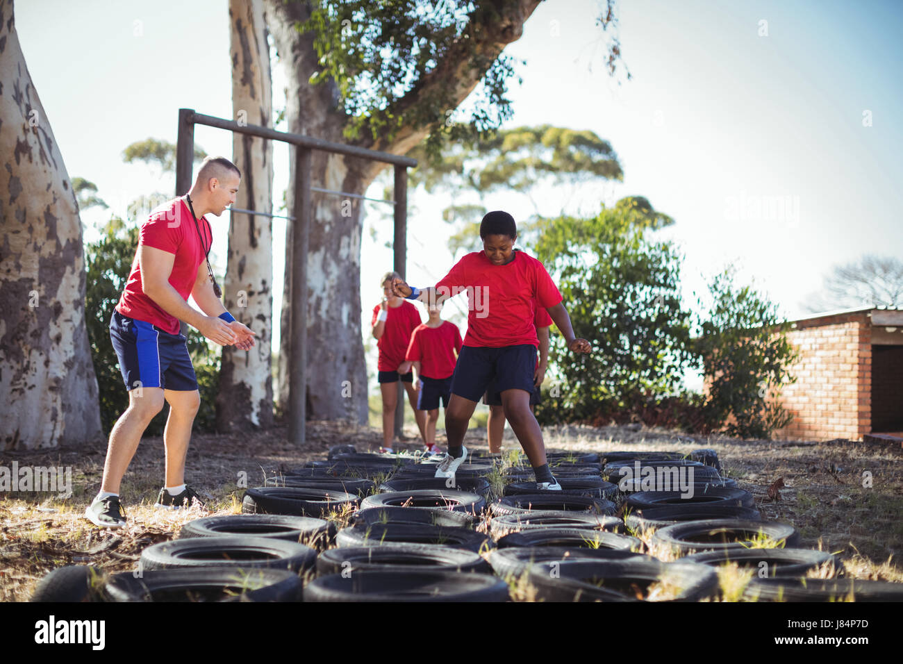 Child obstacle race determination hi-res stock photography and images ...