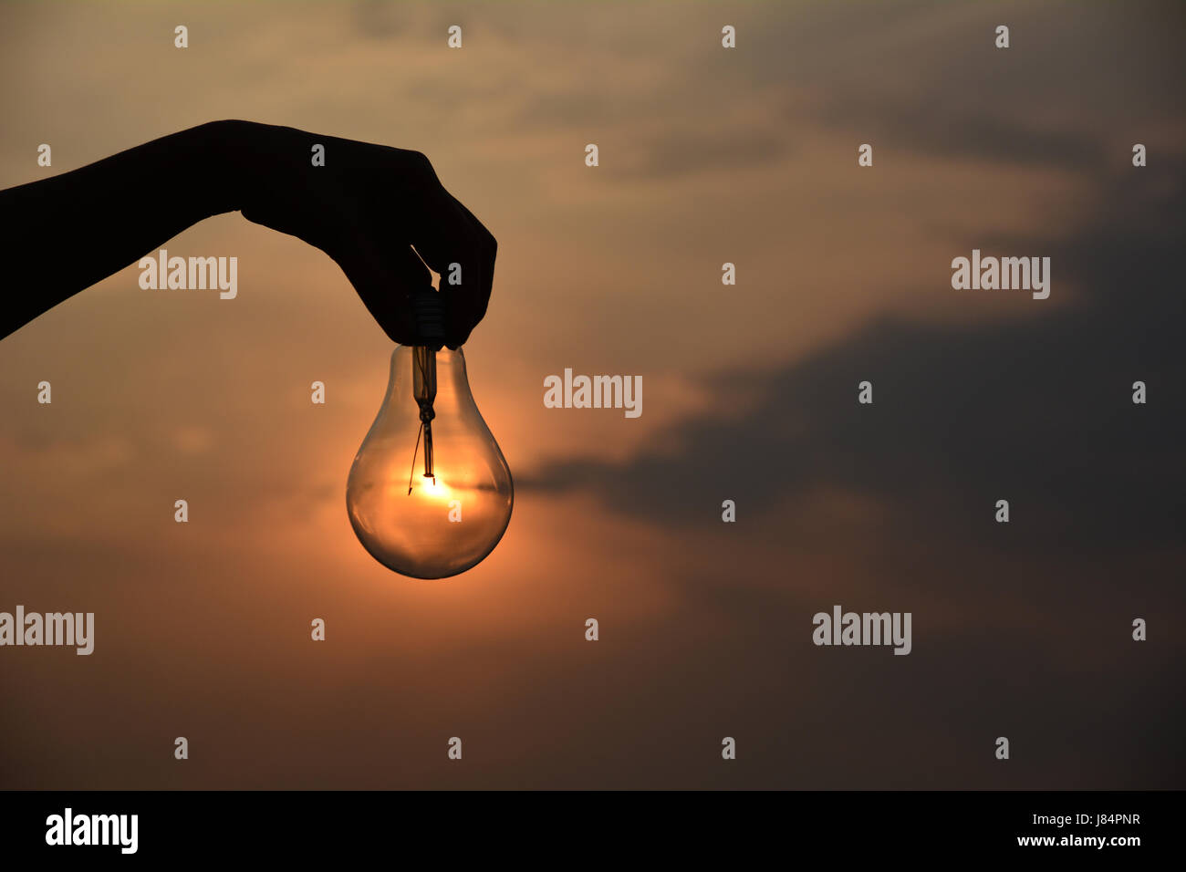 Hand shape lightbulb hi-res stock photography and images - Alamy