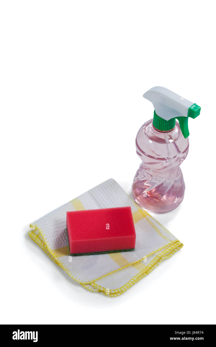 Detergent spray bottle, sponge and cloth on white background Stock ...