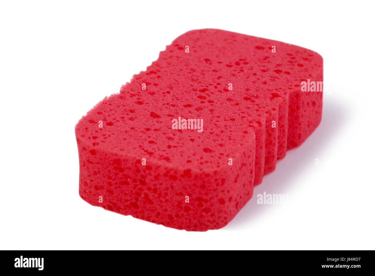 Close-up of sponge pad on white background Stock Photo - Alamy