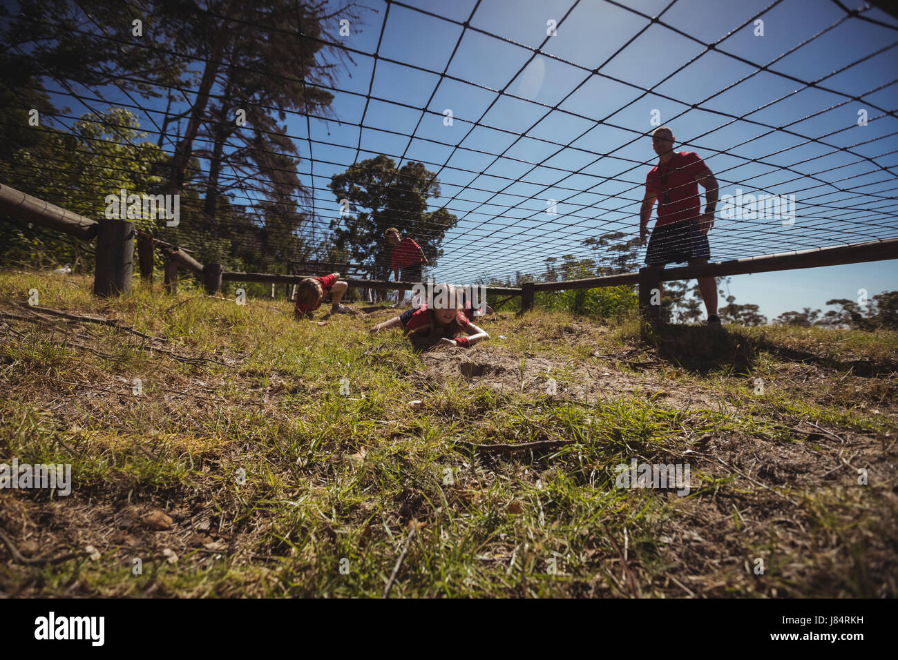 Crawling under net hi-res stock photography and images - Alamy