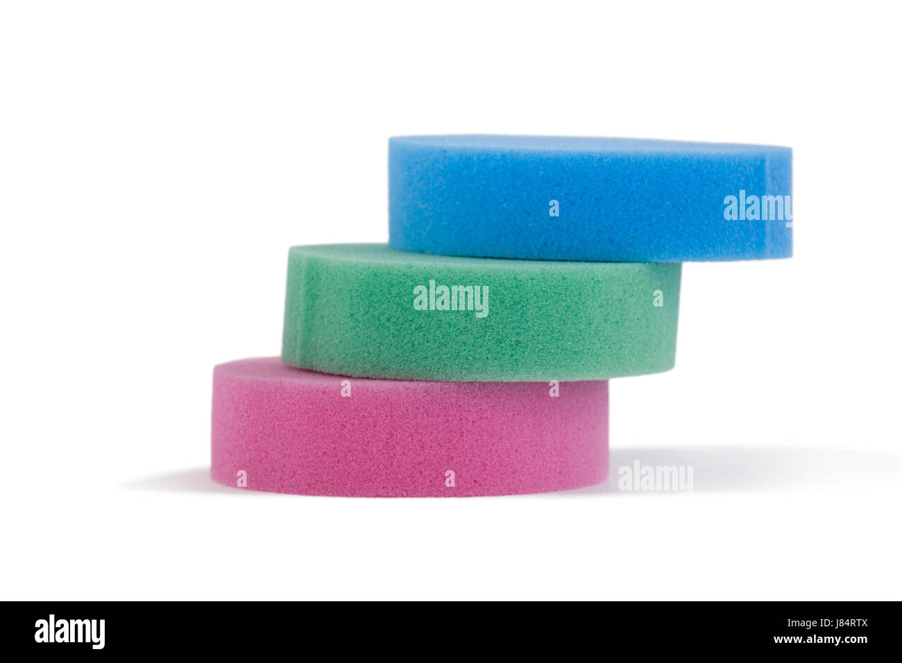 Stacked of sponge pads arranged on white background Stock Photo - Alamy