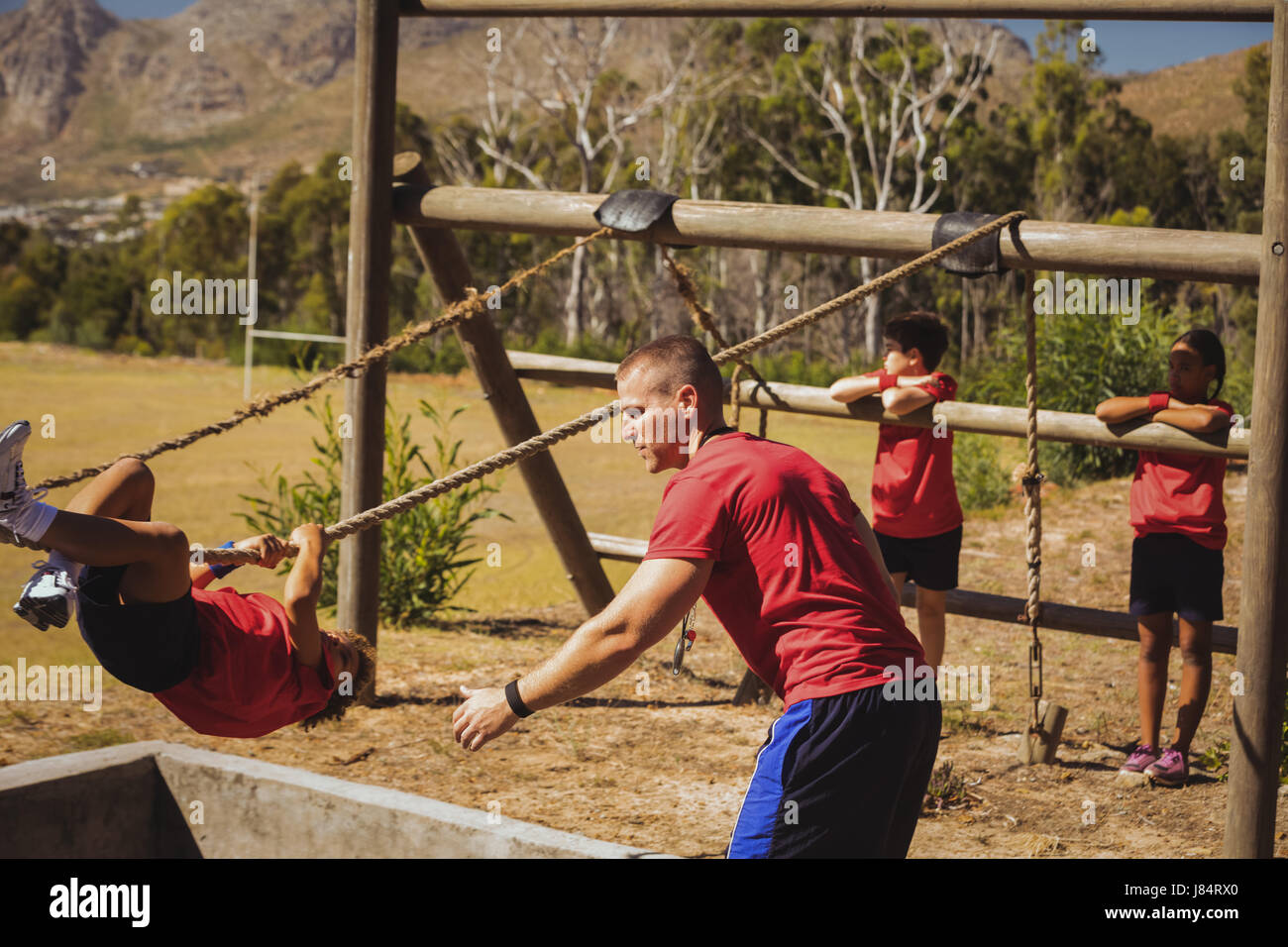 Child obstacle race determination hi-res stock photography and images ...