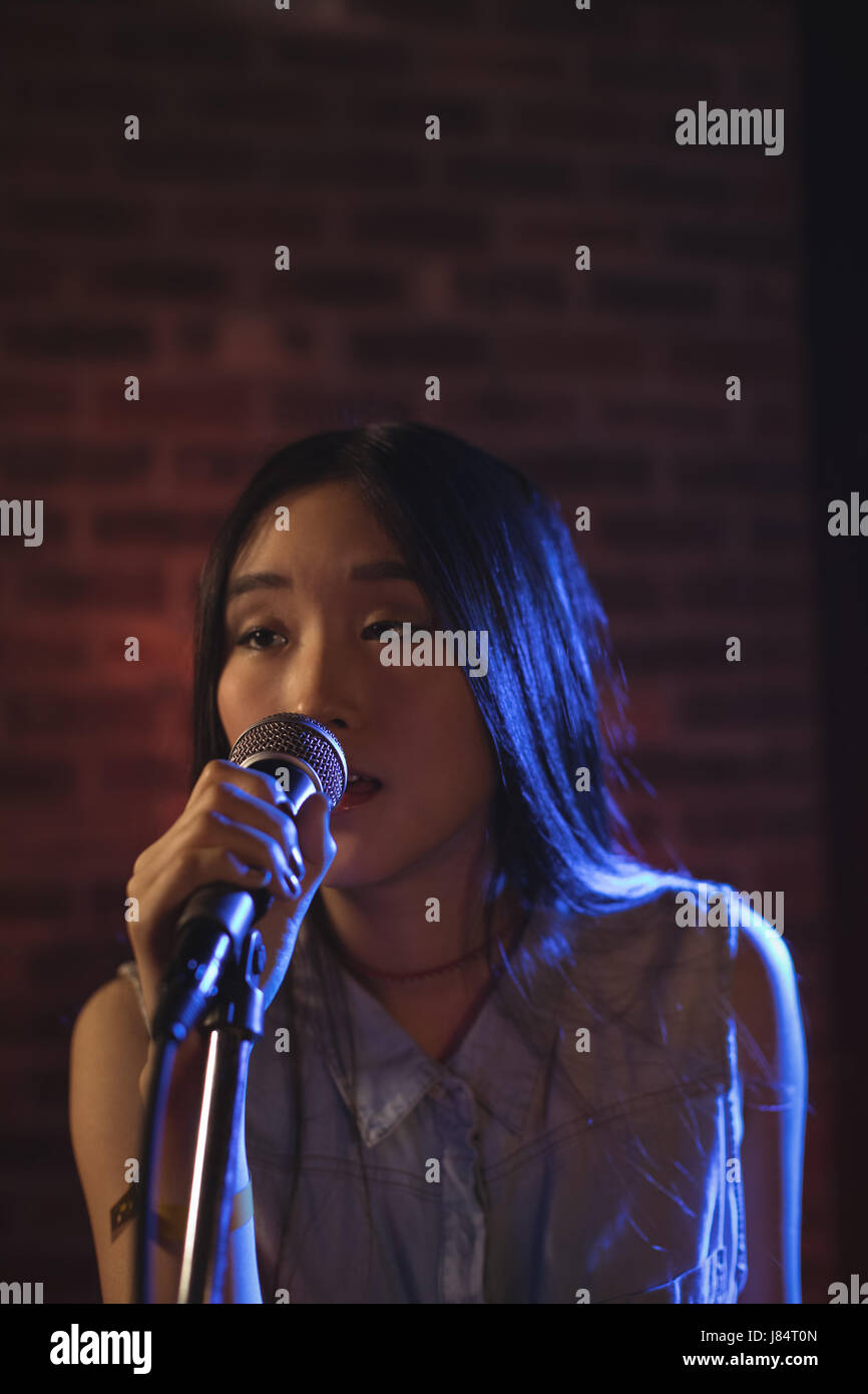 Beautiful blonde female singer hi-res stock photography and images - Alamy