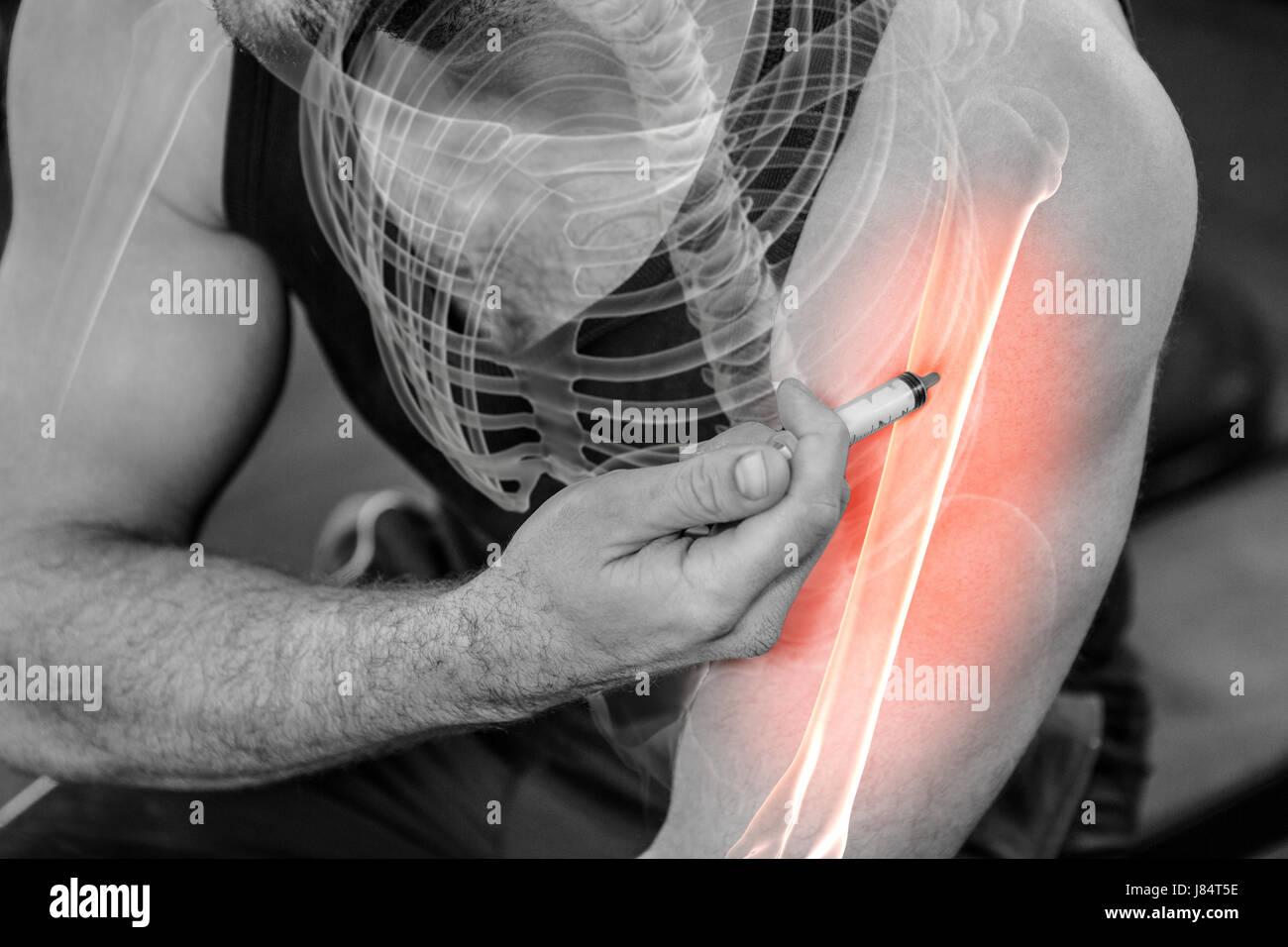 Digital composite of highlighted arm of strong man injecting anabolic ...