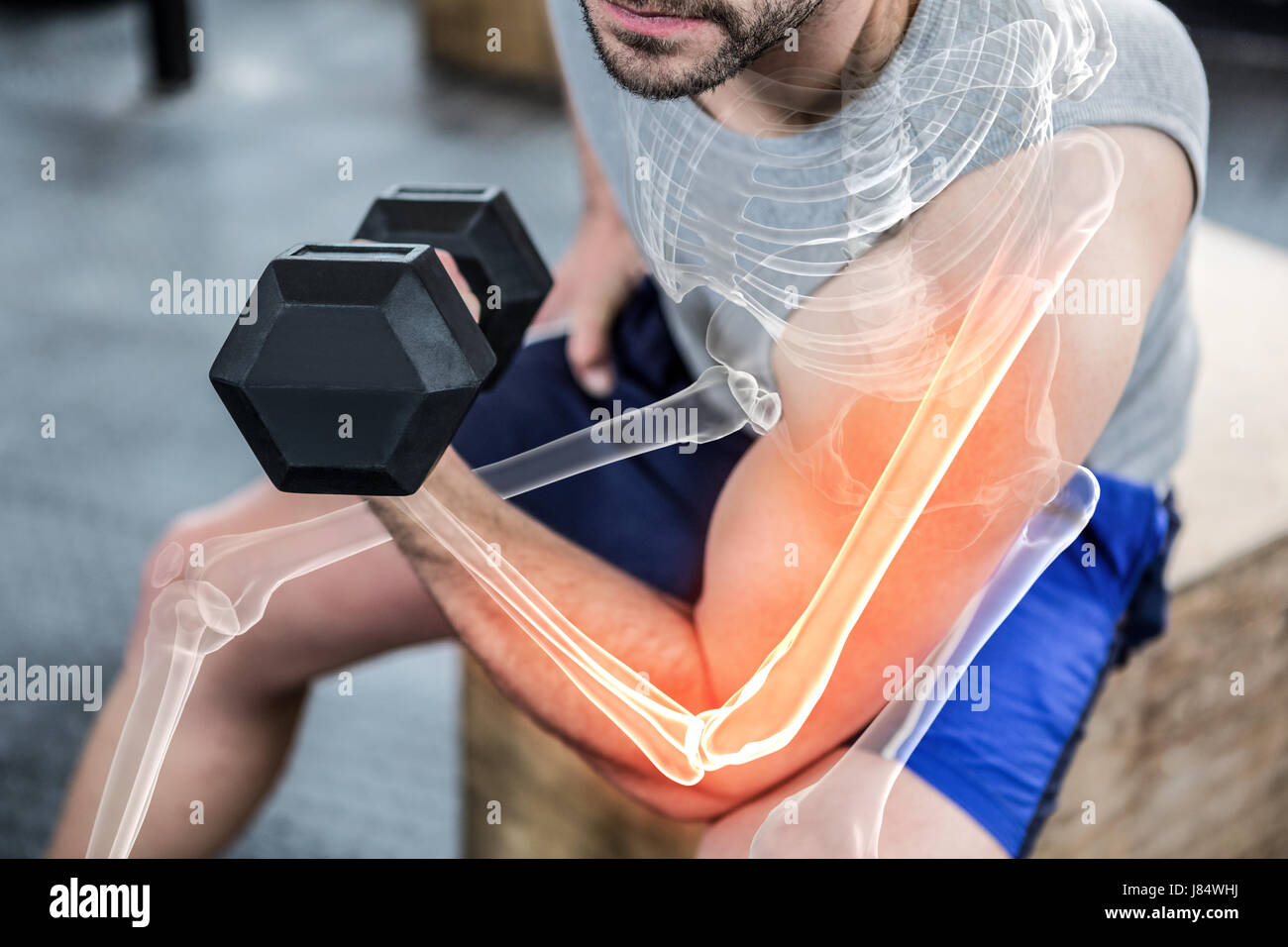 Digital composite of highlighted arm of strong man lifting weights at ...