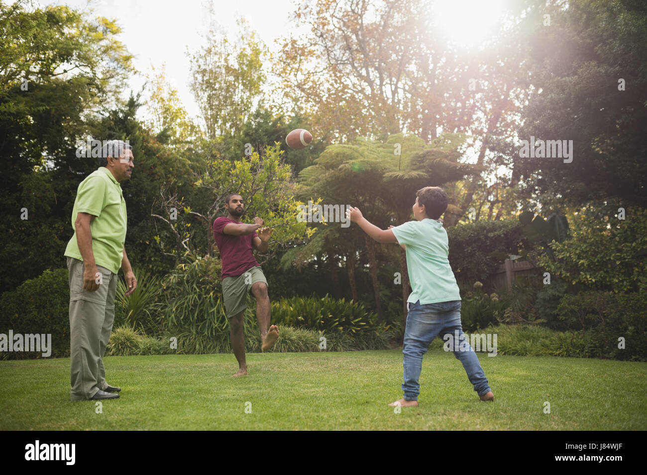 Boy holding rugby ball hi-res stock photography and images - Alamy
