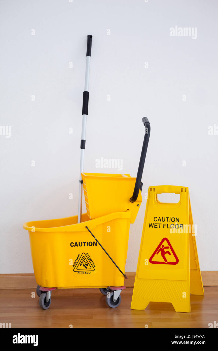 Mop bucket sign hi-res stock photography and images - Alamy