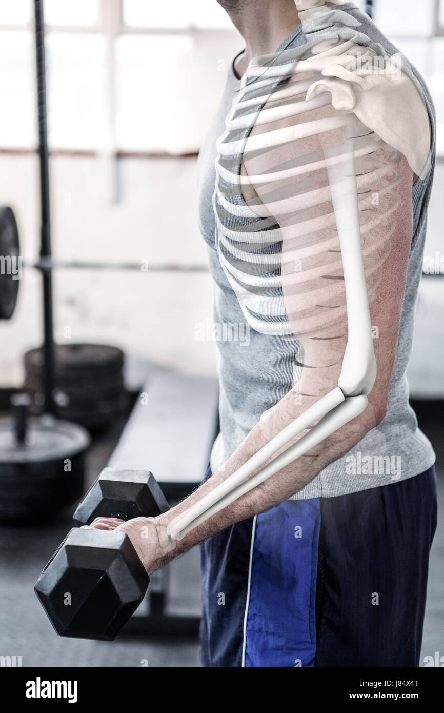 Digital composite of highlighted arm of strong man lifting weights at ...