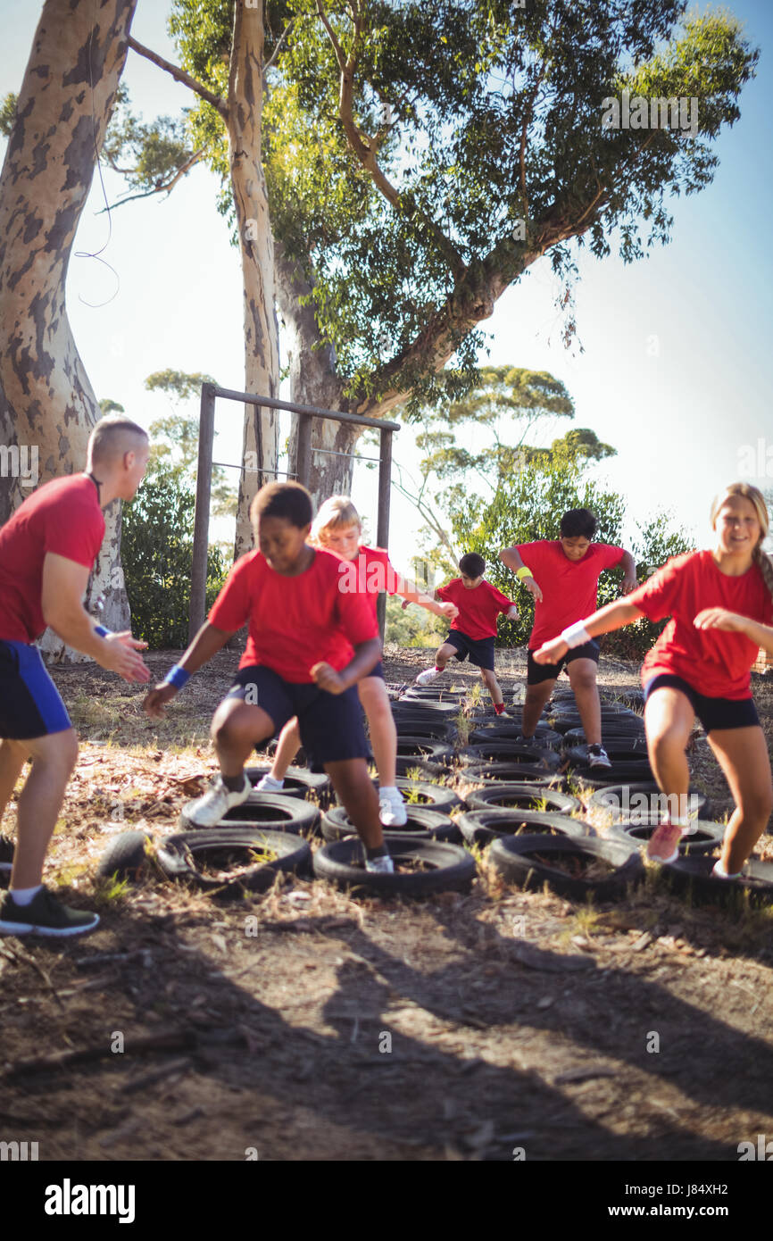 Child obstacle race determination hi-res stock photography and images ...
