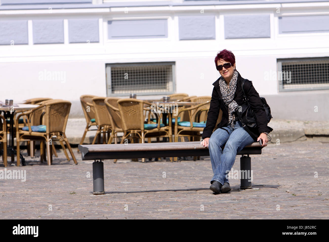 woman city town chairs urban put sitting sit facilitate ease resting ...