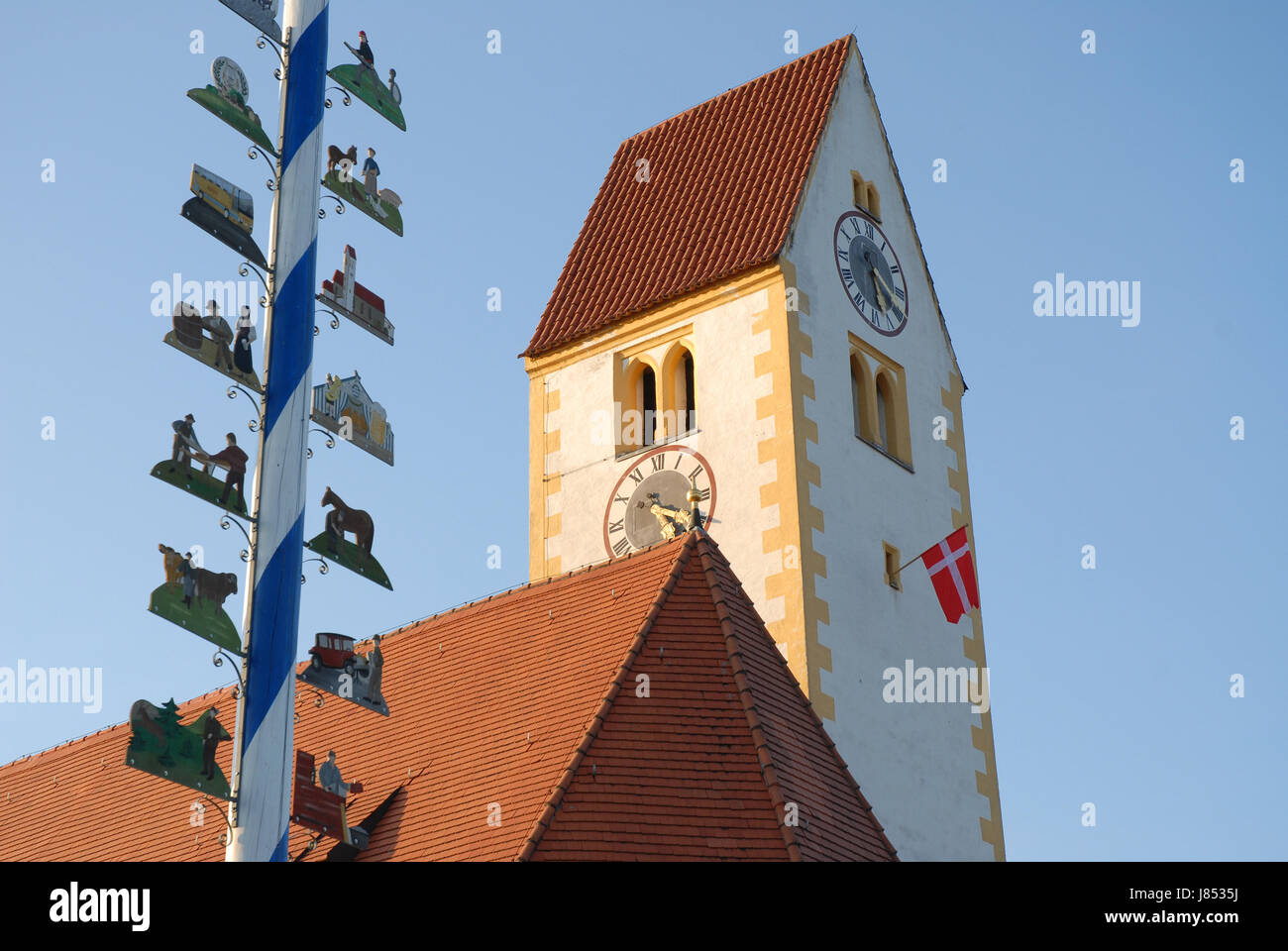 maypole with church tower Stock Photo - Alamy