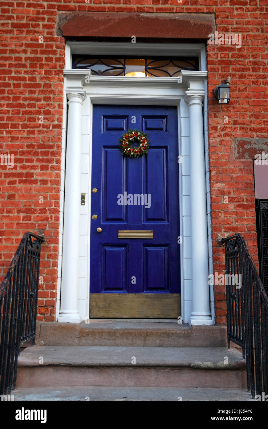blue house building detail wood entrance door brick style of ...