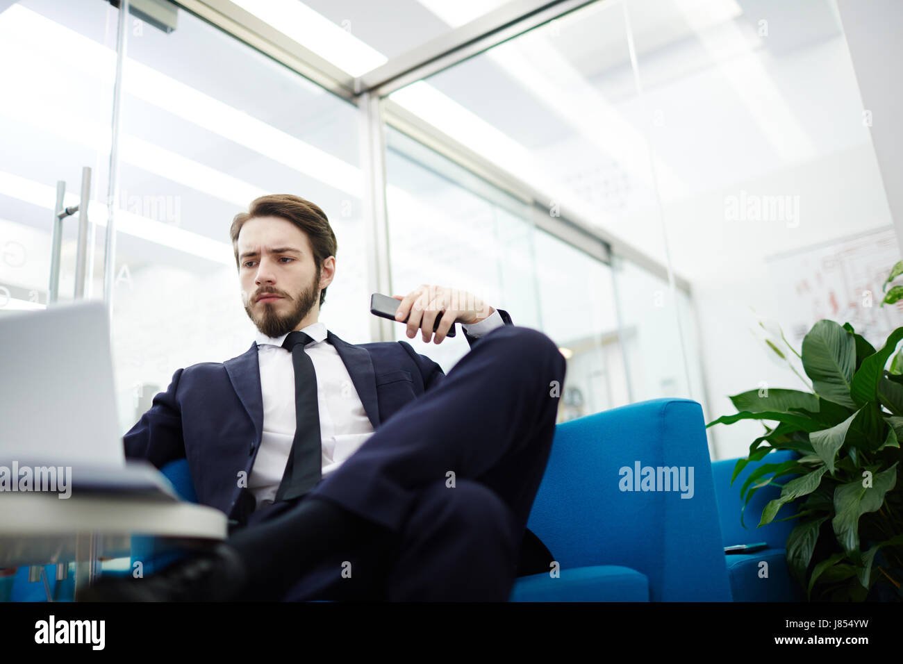 Professional salesman or trader working in office Stock Photo - Alamy