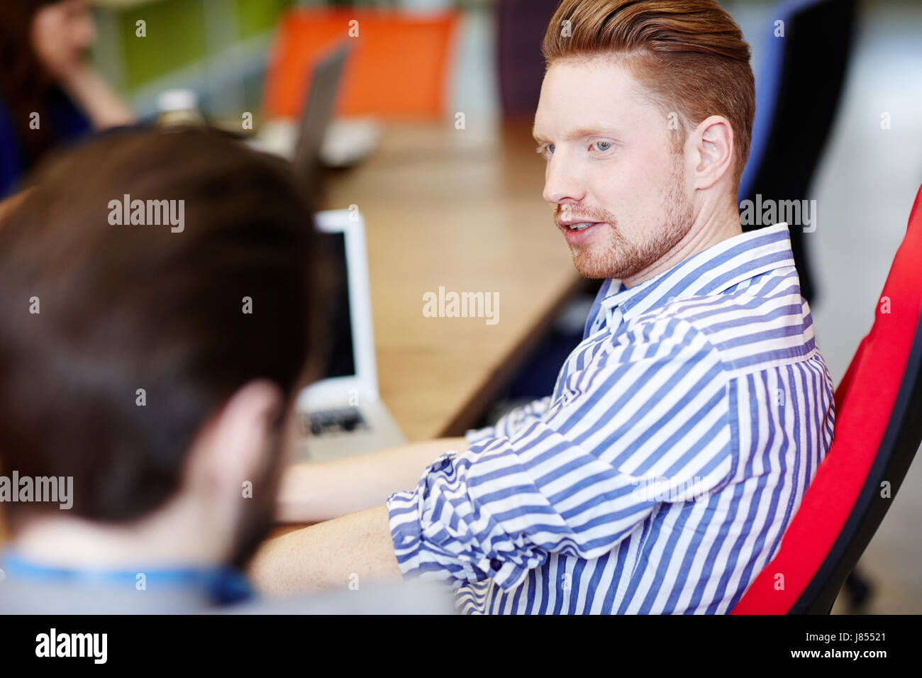 Talking to employee hi-res stock photography and images - Alamy