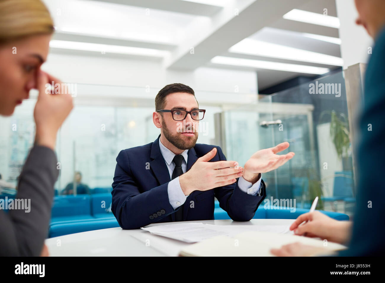 Office briefing serious hi-res stock photography and images - Alamy