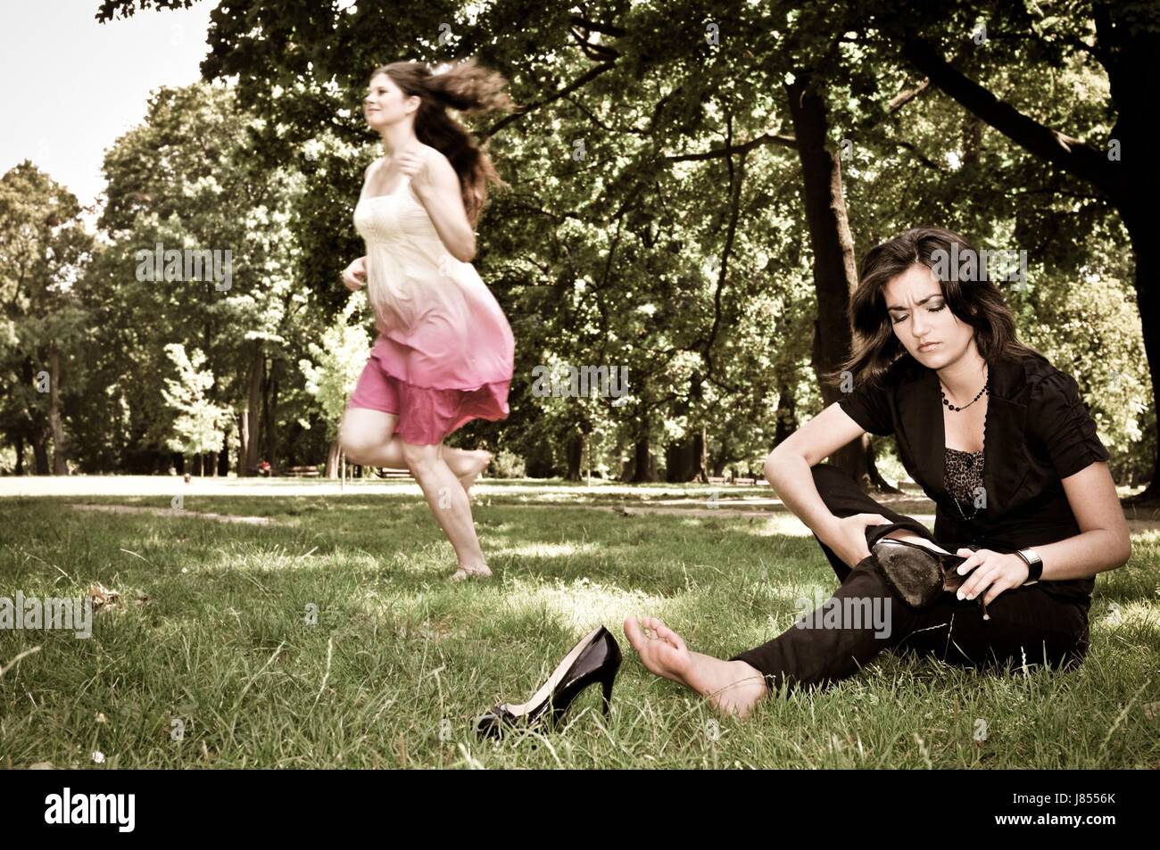 woman legs contrast shoes feet barefoot confrontation high tall woman ...