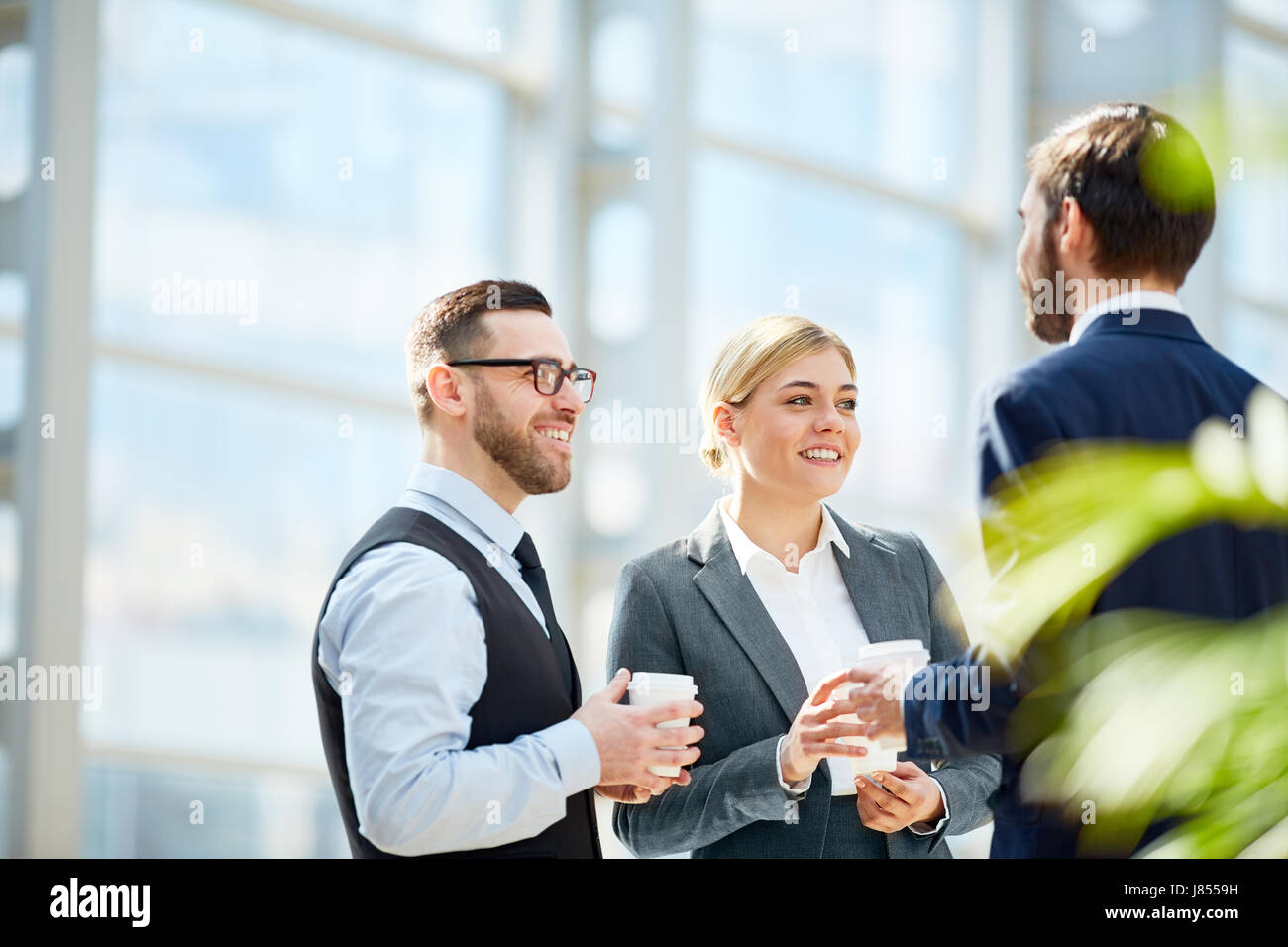 Business partners having discussion hi-res stock photography and images ...