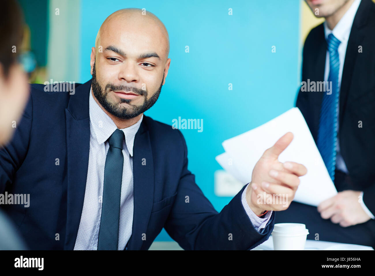 Handsome smiling bald man talking hi-res stock photography and images ...