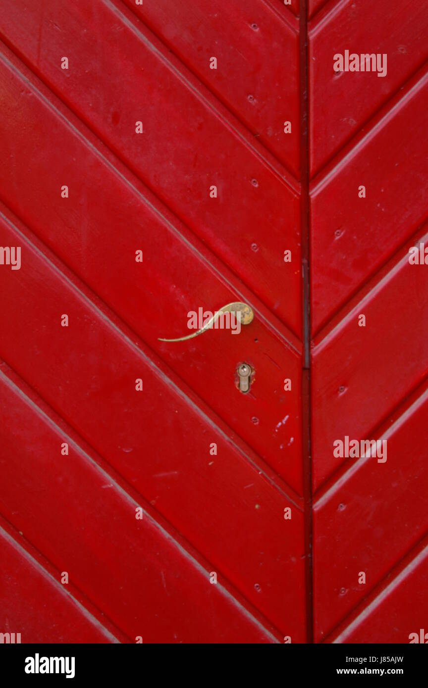 red door with brass handle and lock Stock Photo - Alamy