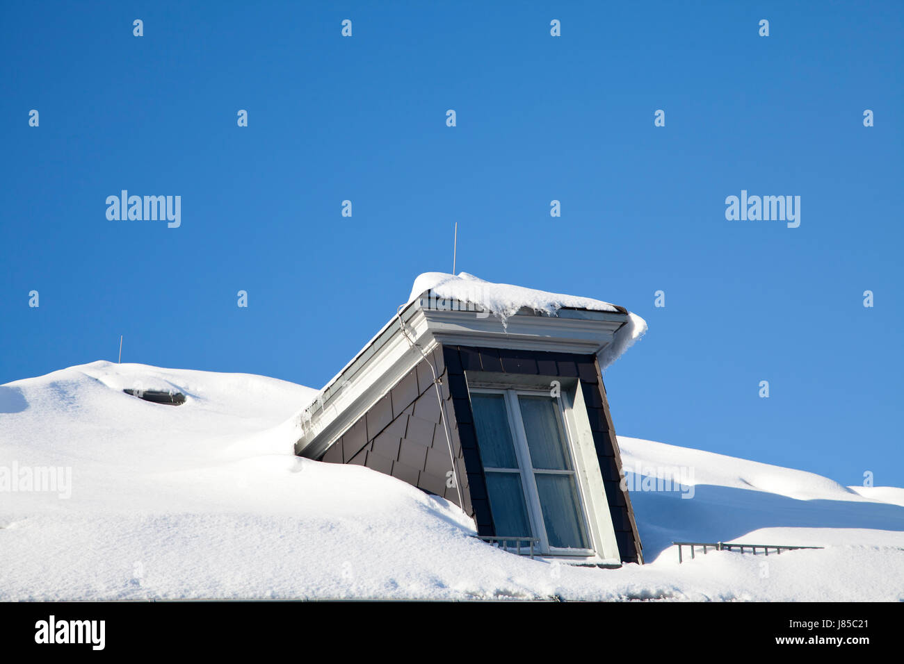 winter window porthole dormer window pane season snow rooftop blue ...