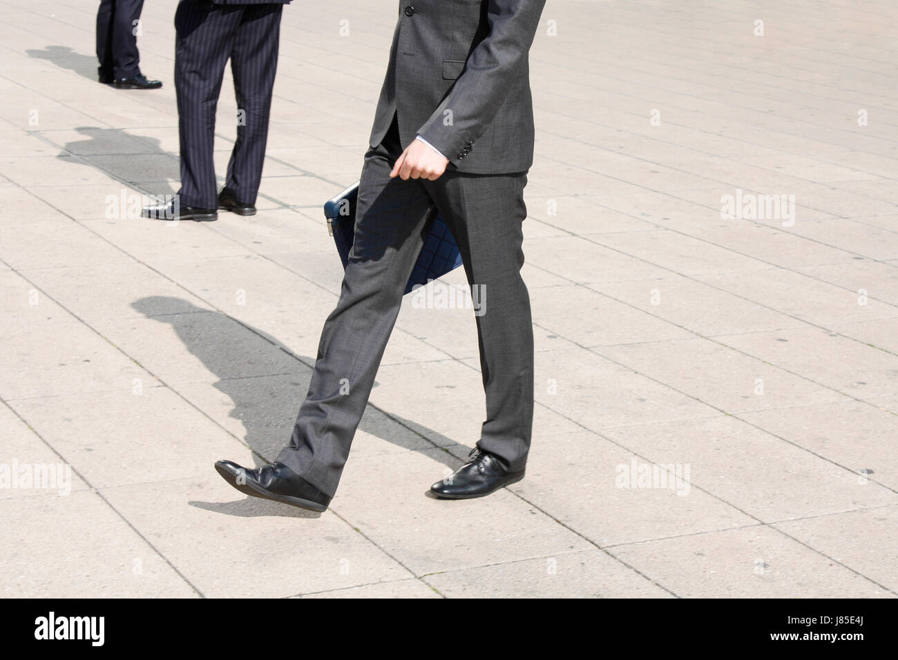 legs walk go going walking men man shoes pavement horizontal briefcase ...