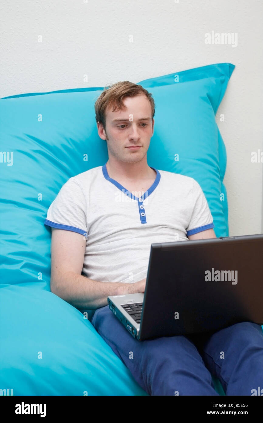 guy study blue laptop notebook computers computer write wrote writing ...