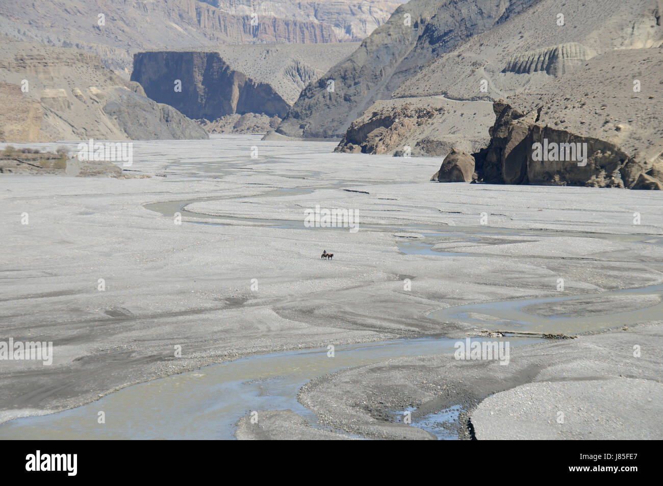 asia ravine river bed nepal mustang himalayas travel stone horse hike ...